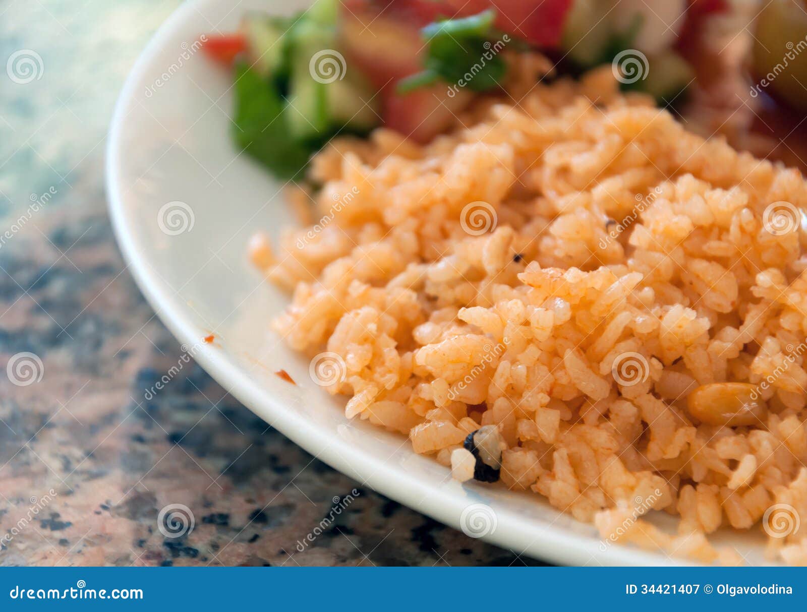 Delicious pilaf on plate stock image. Image of table - 34421407