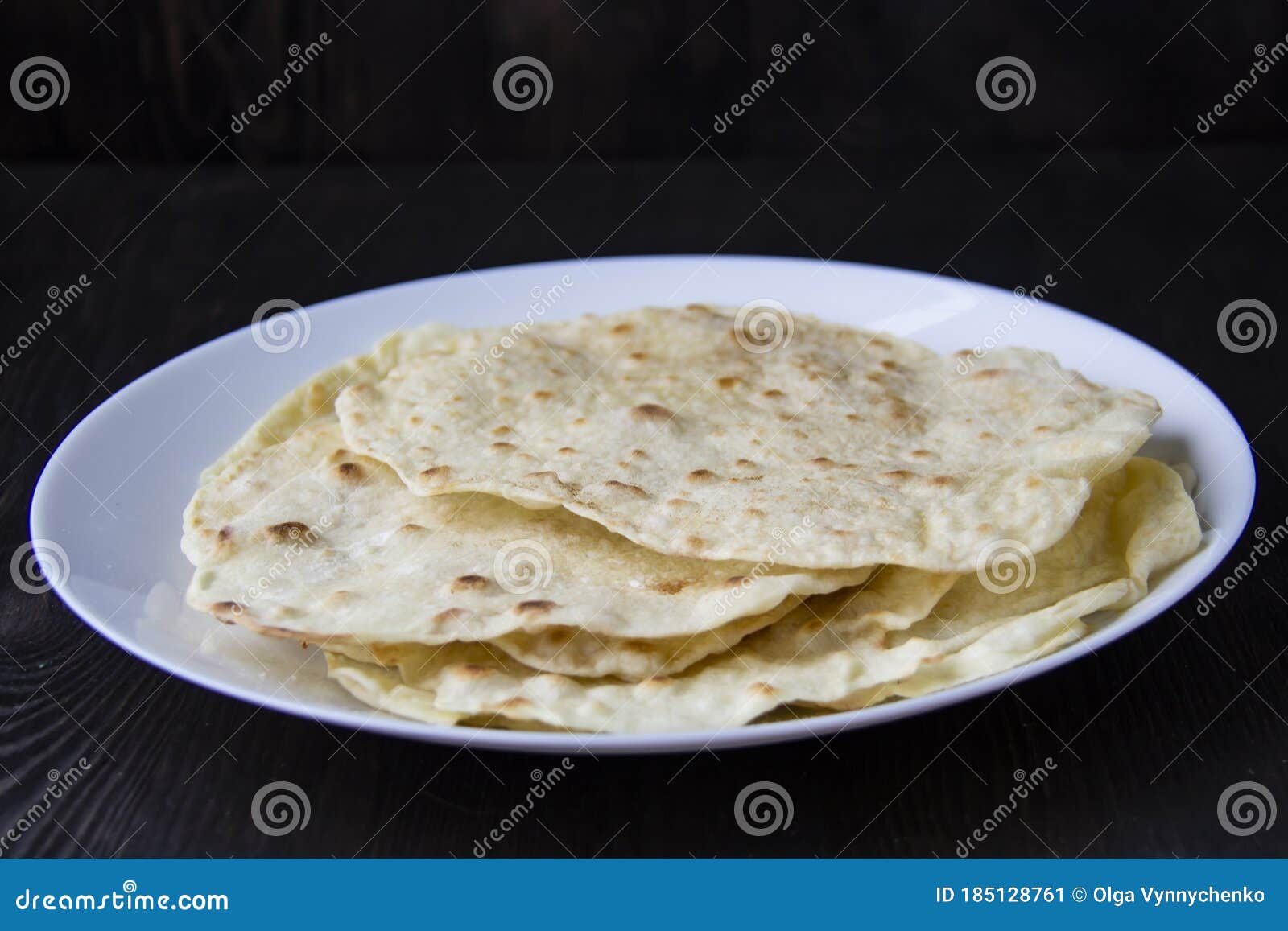 Delicious Pita Bread Made at Home in a Pan. Thin Pita Bread on a White ...
