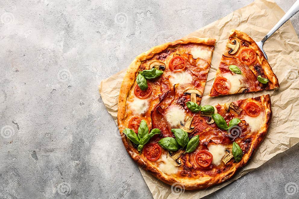 Delicious Pizza on Grey Background Stock Photo - Image of meat ...