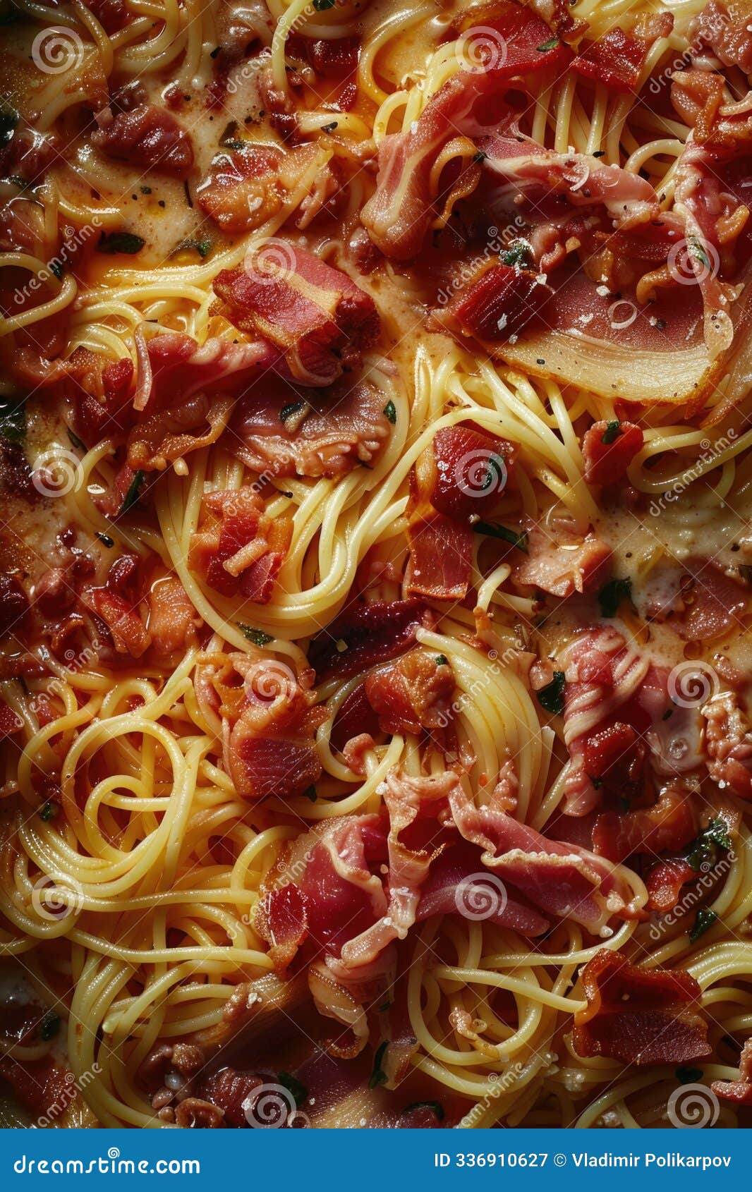 A Delicious Plate of Spaghetti Topped with Crispy Bacon and Melted ...