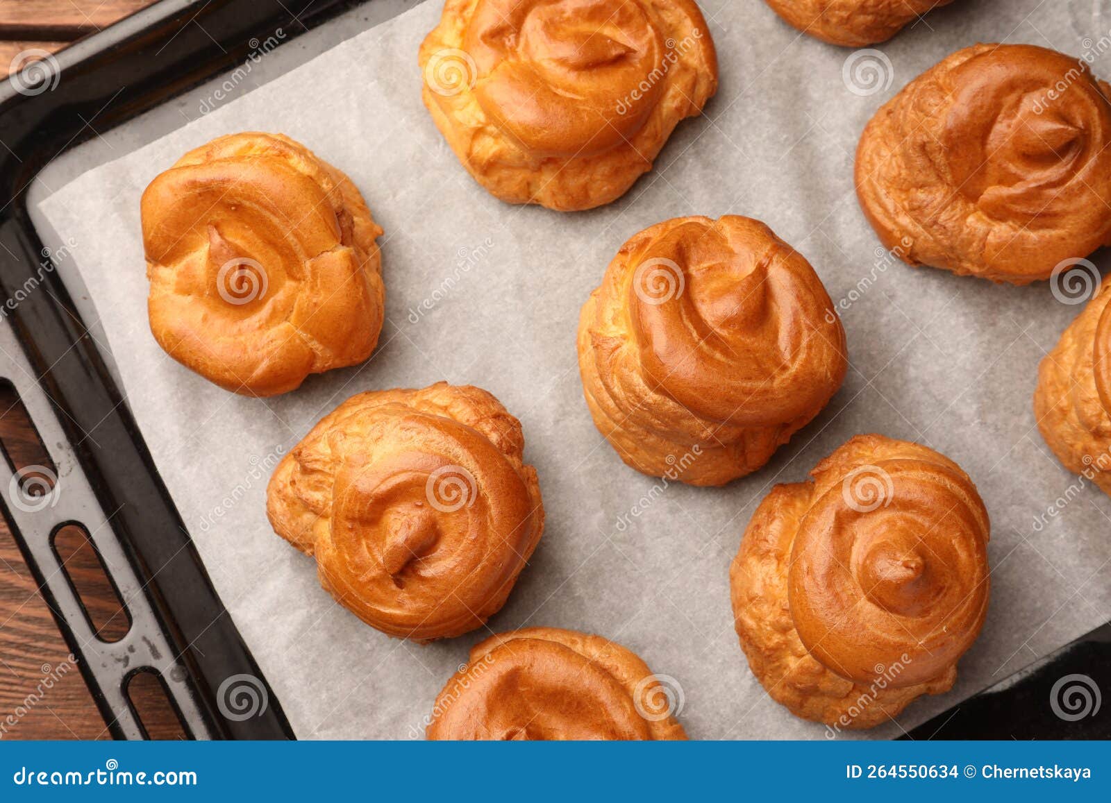 Delicious Profiteroles on Baking Pan, Top View Stock Photo - Image of ...