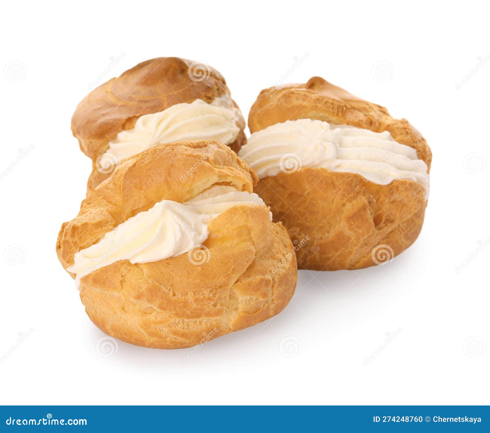 Delicious Profiteroles with Cream Filling on White Background Stock ...