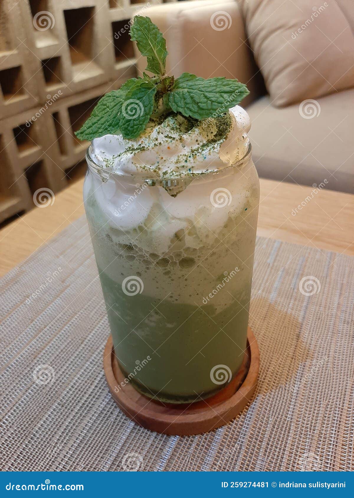 Delicious and Refreshing Green Tea Float Decorated with Mint Leaves ...