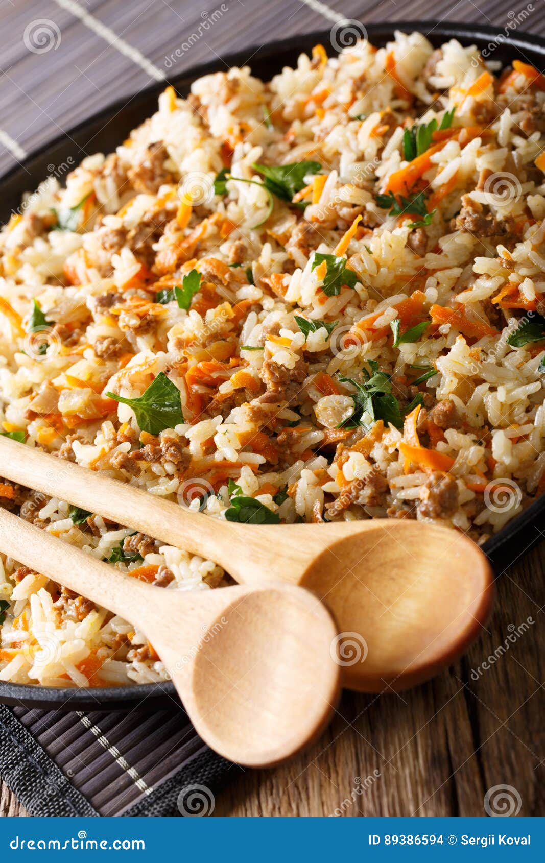 Delicious Rice with Minced Meat and Carrots Close-up on a Plate. Stock ...
