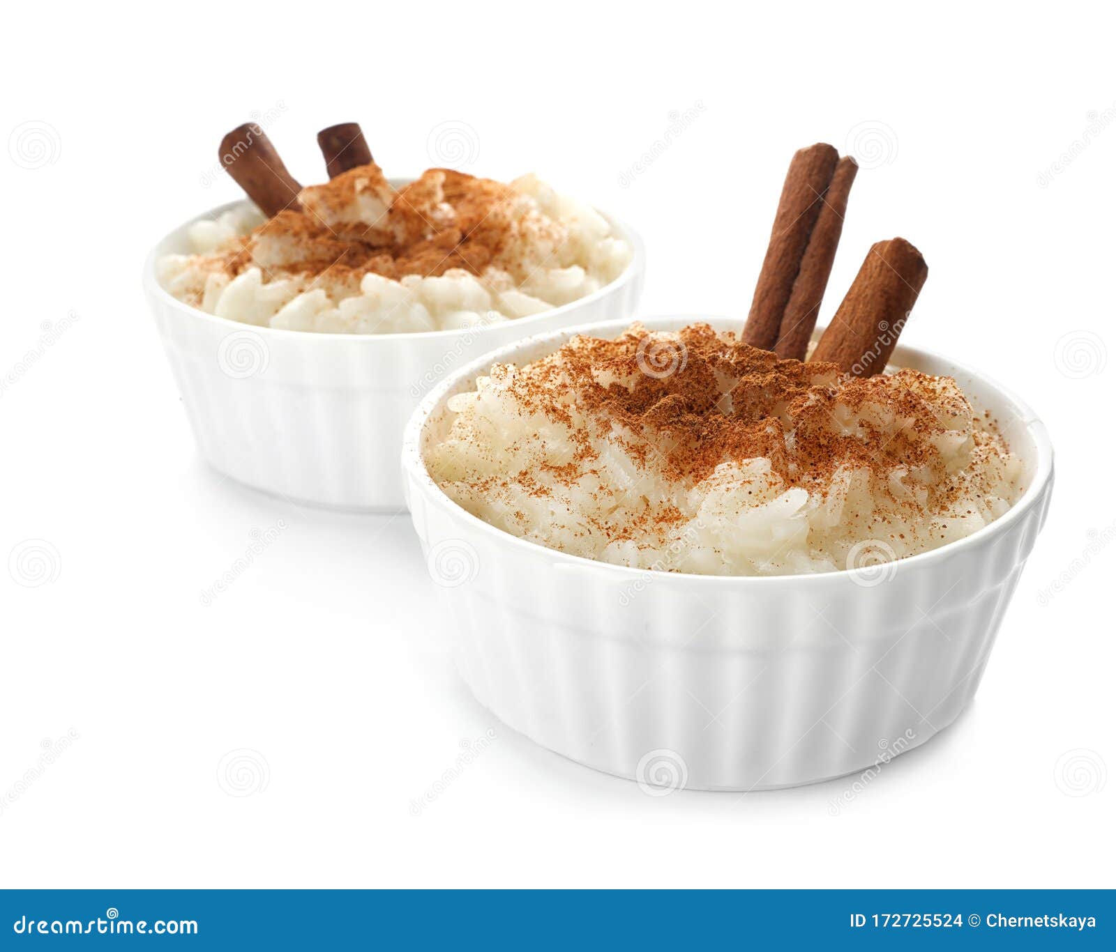 Delicious Rice Pudding with Cinnamon on White Stock Photo - Image of ...