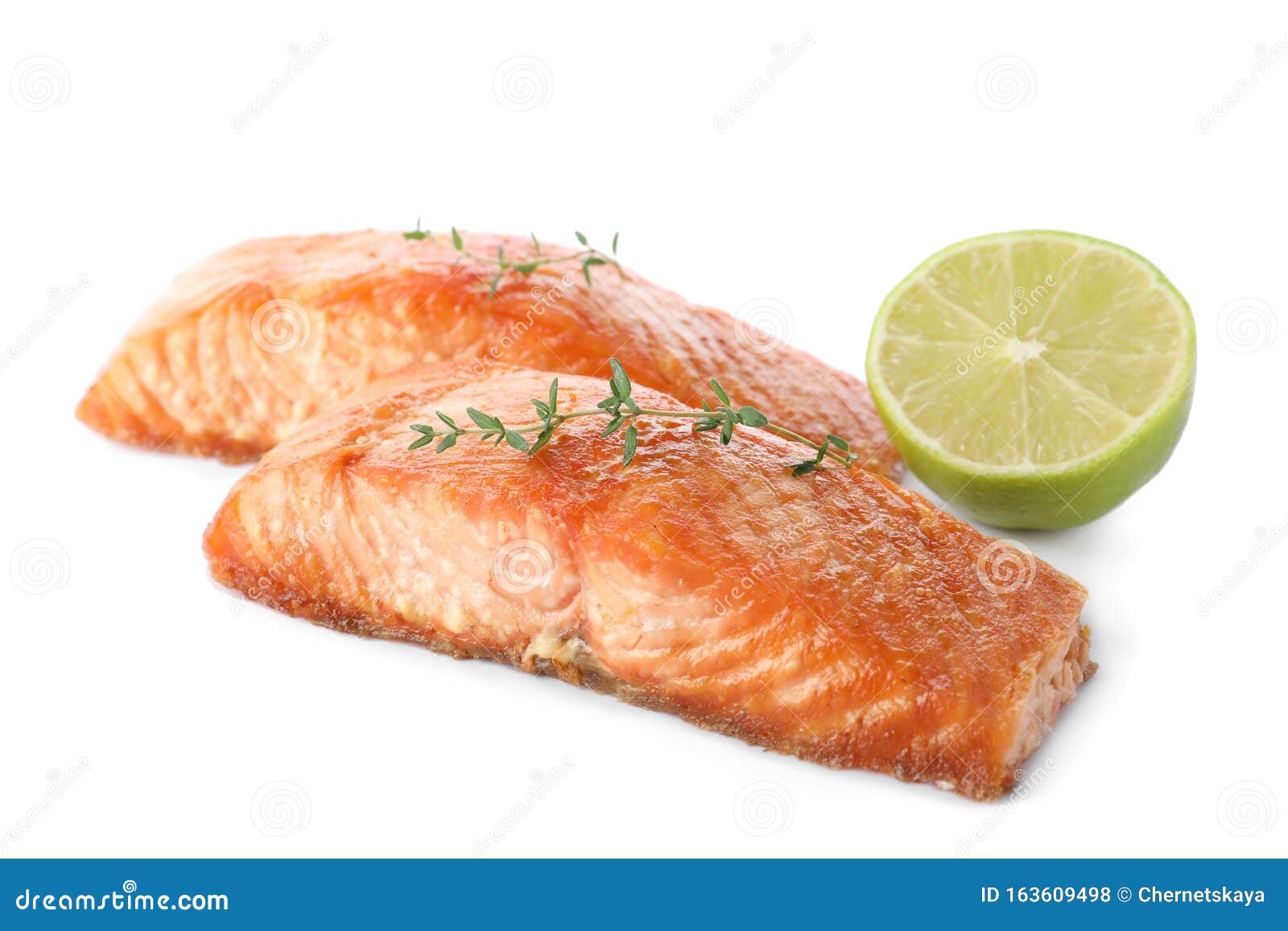Delicious Roasted Fish with Thyme and Lime Isolated on White Stock ...