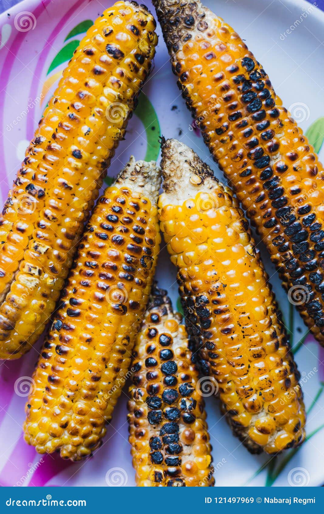 Roasted Corn on the Plate stock image. Image of cooked - 121497969