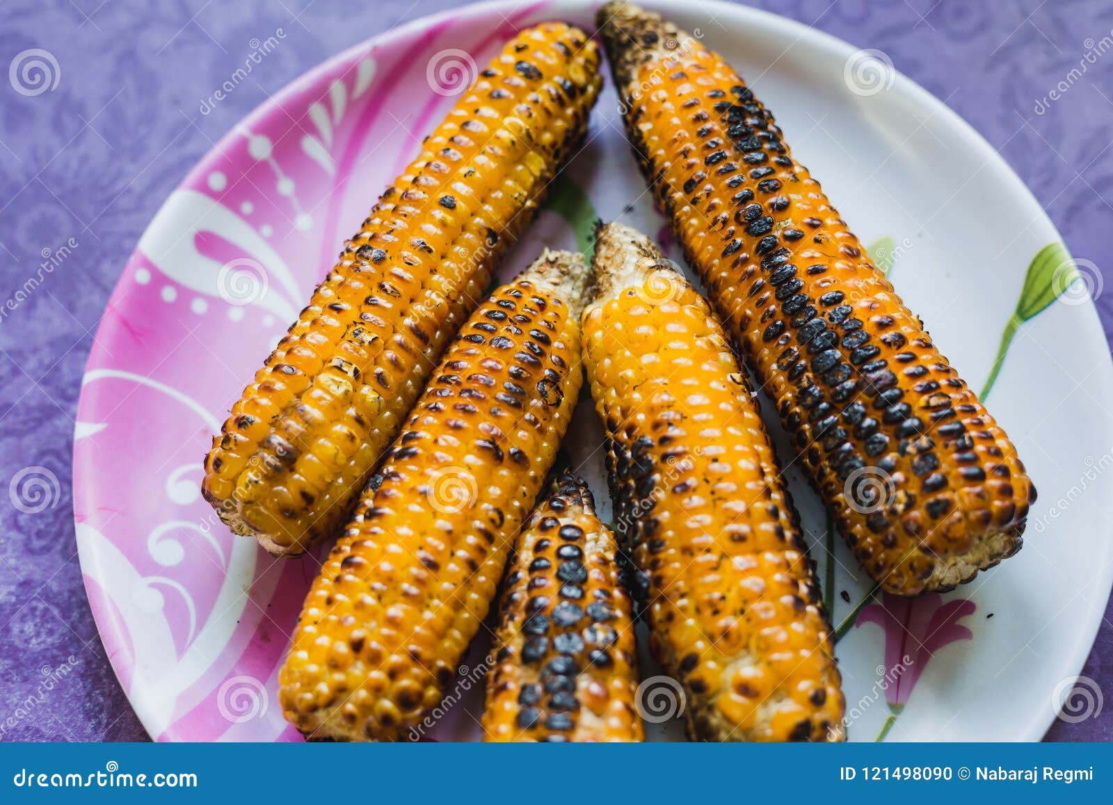 Roasted Corn on the Plate stock photo. Image of corn - 121498090