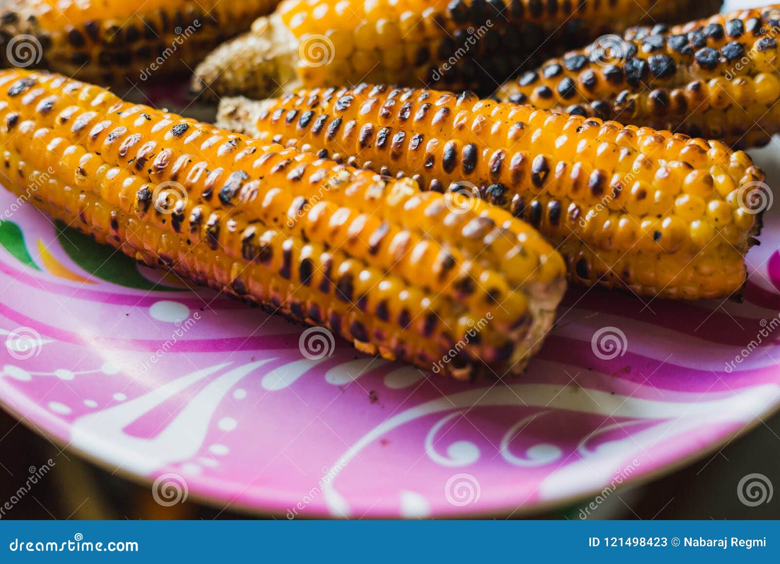 Roasted Corn on the Plate stock image. Image of maize - 121498423