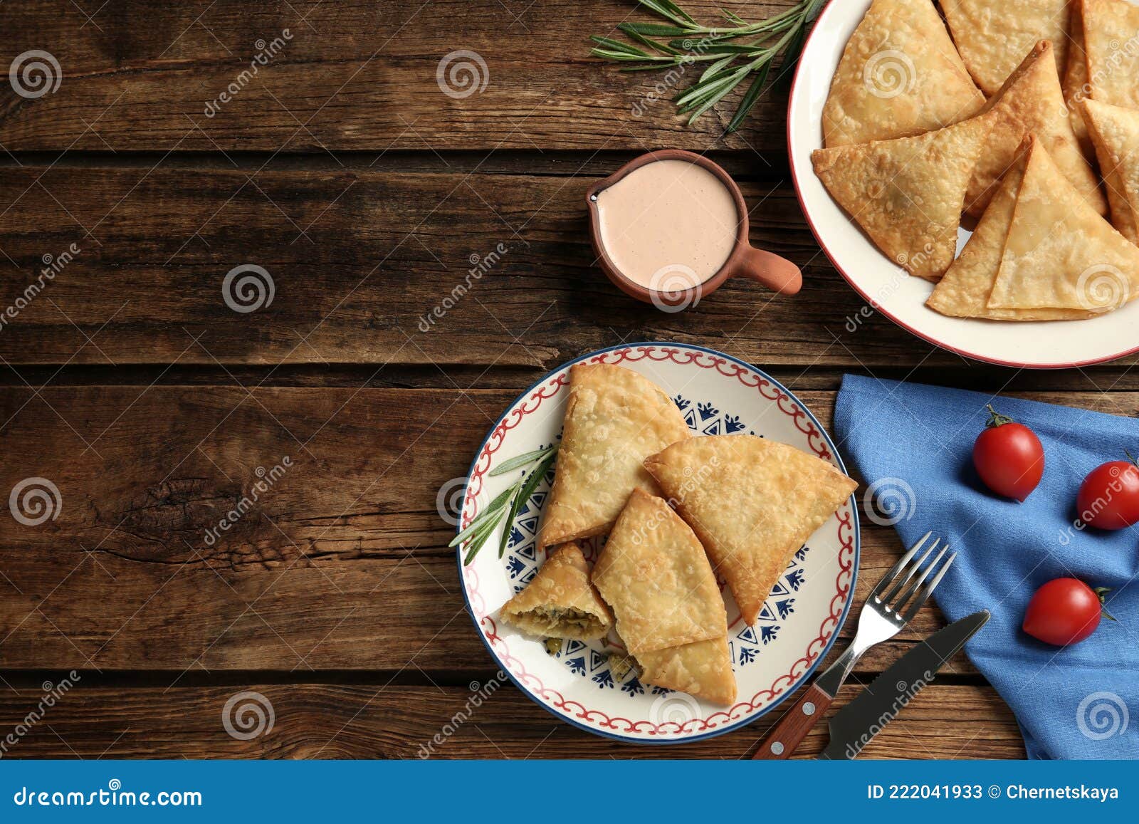 Delicious Samosas with Sauce on Wooden Table, Flat Lay. Space for Text ...