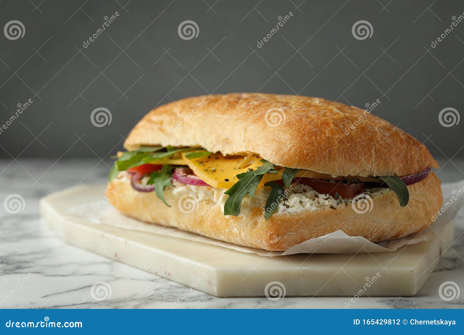 Delicious Sandwich with Fresh Vegetables and Cheese on Marble Table ...