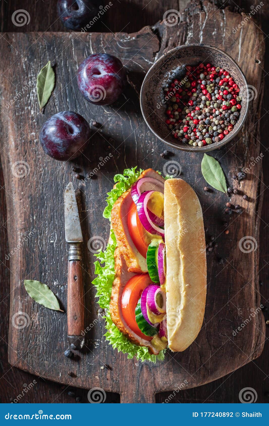 Delicious Sandwich Made of Pork Neck with Plums and Vegetables Stock ...