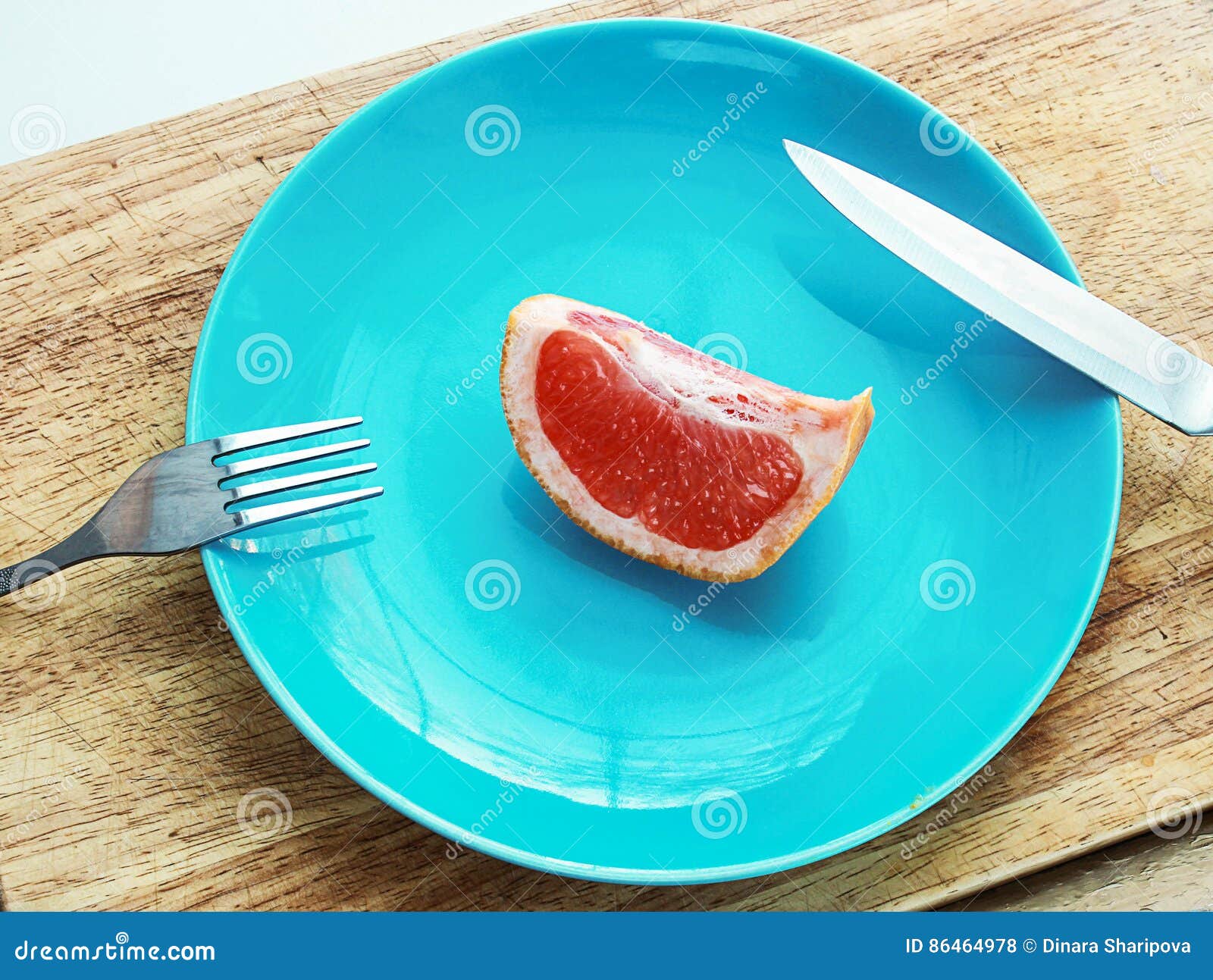Delicious Slice of Grapefruit on a Plate Stock Photo - Image of citrus ...