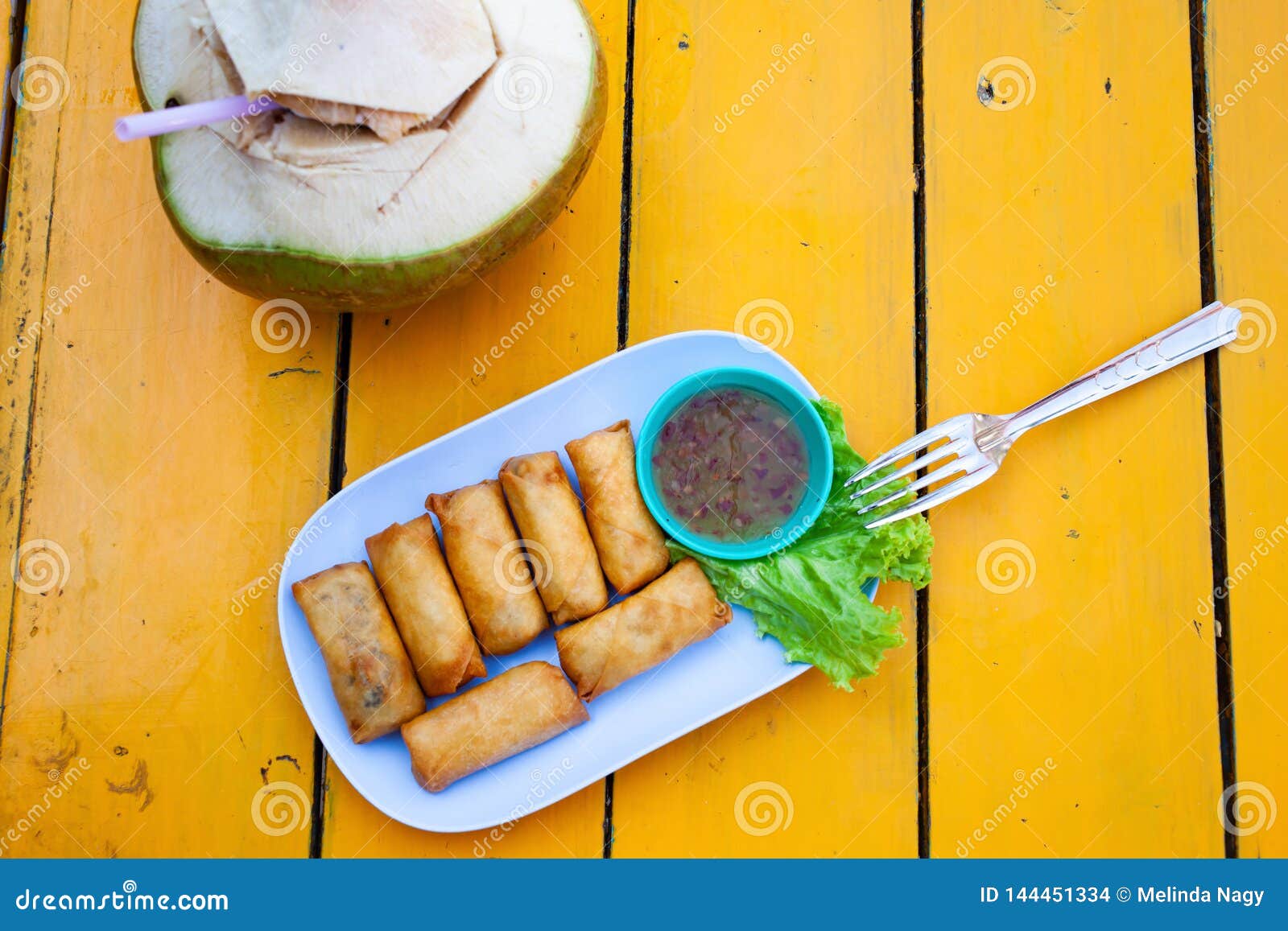 Delicious Spring Rolls on a Yellow Table - Happy Meal Stock Photo ...