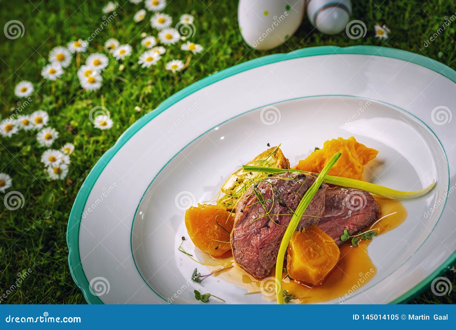 Delicious Steak with Spring Vegetables and Sauce Served on White Plate ...