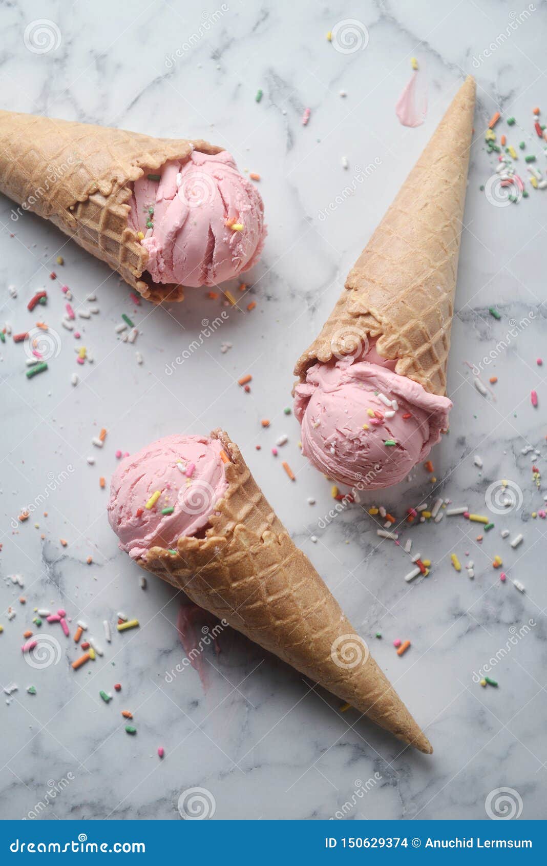 Delicious Strawberry Ice Cream Cone Decorated With Sugar Rainbow