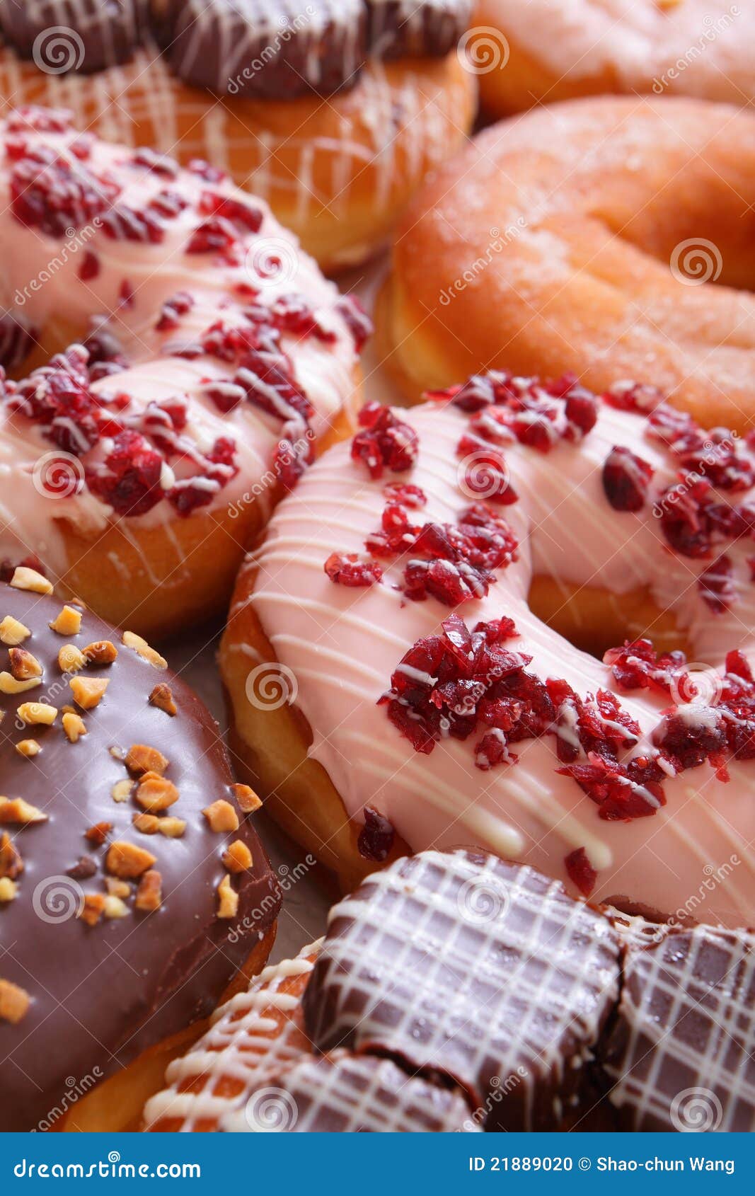 Delicious and sweet donuts stock photo. Image of iced - 21889020