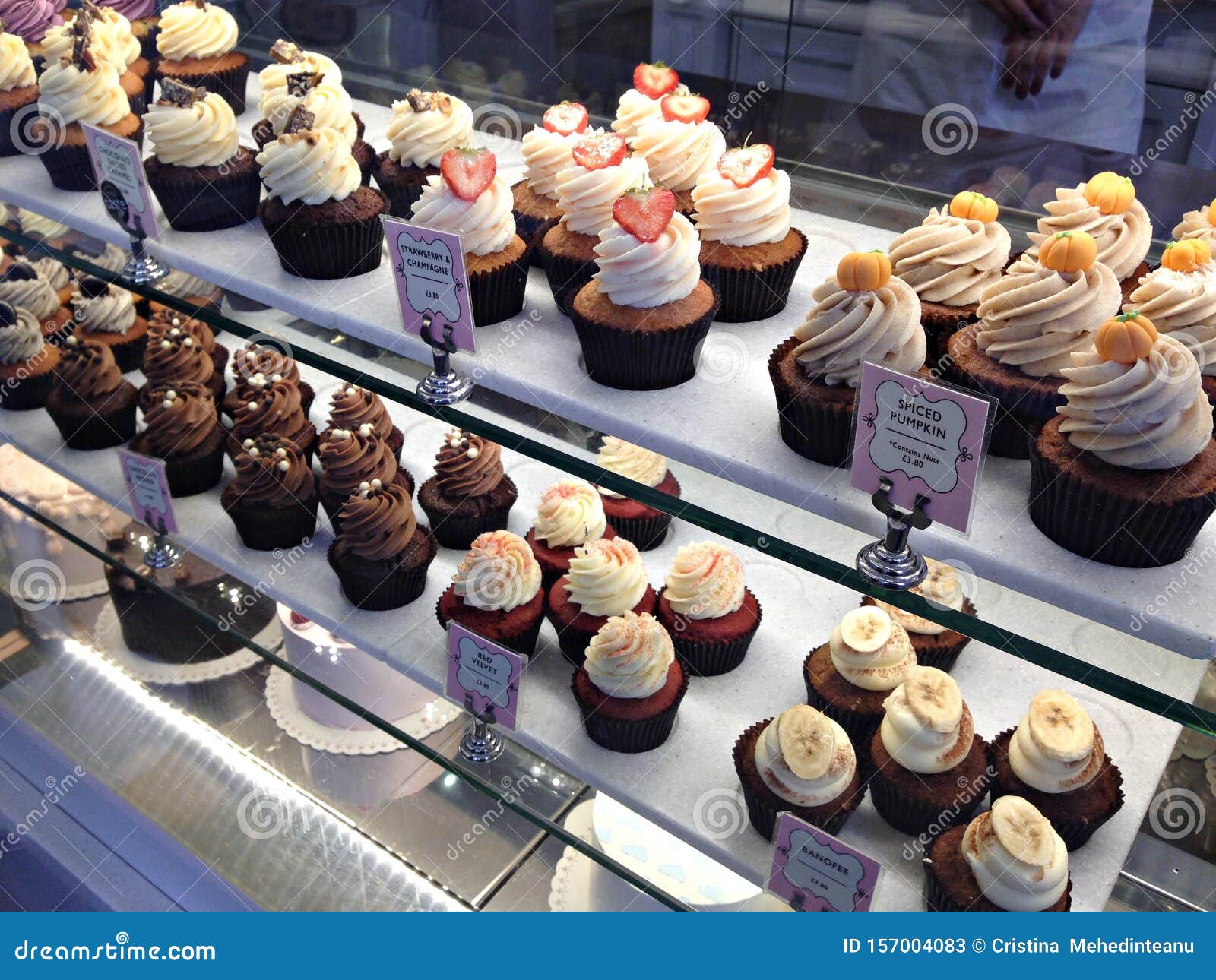 Cupcakes in a Cake Shop Window Editorial Stock Photo - Image of cake ... Cupcakes in a Cake Shop Window Editorial Stock Photo - Image of cake ...