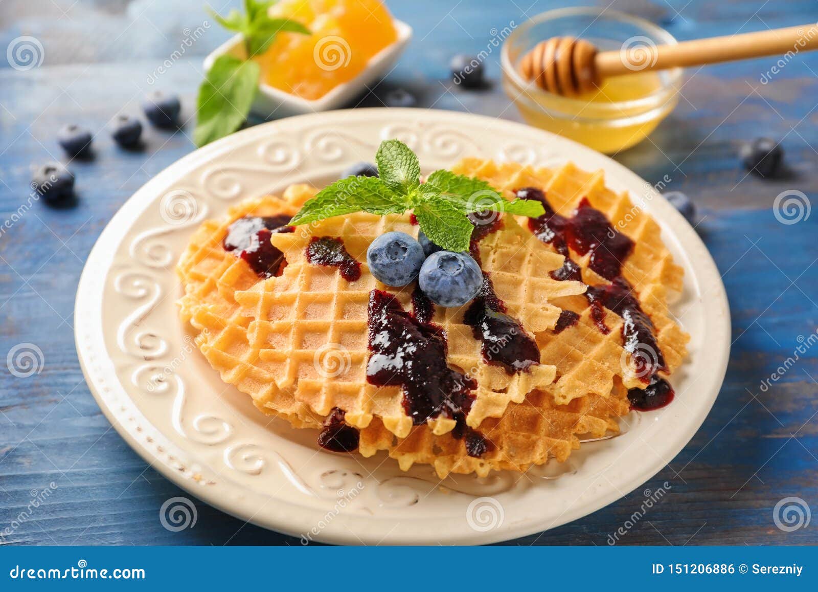 Delicious Waffles with Blueberry Jam on Plate Stock Photo - Image of ...