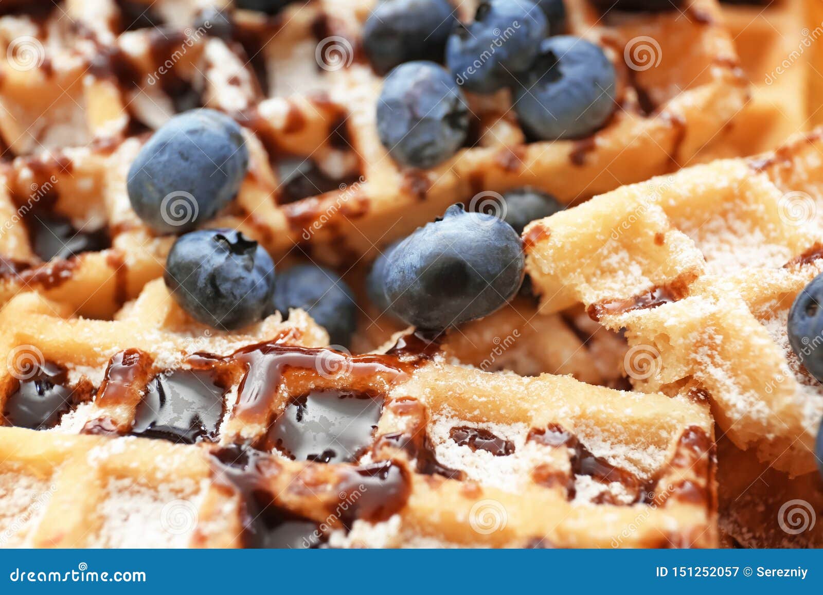 Delicious Waffles with Chocolate Syrup and Blueberries, Closeup Stock ...