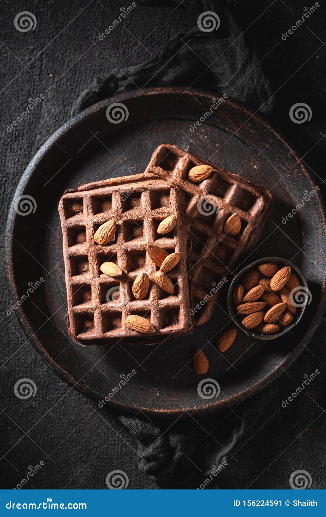 Delicious Waffles Made of Cocoa with Nuts on Dark Table Stock Image ...
