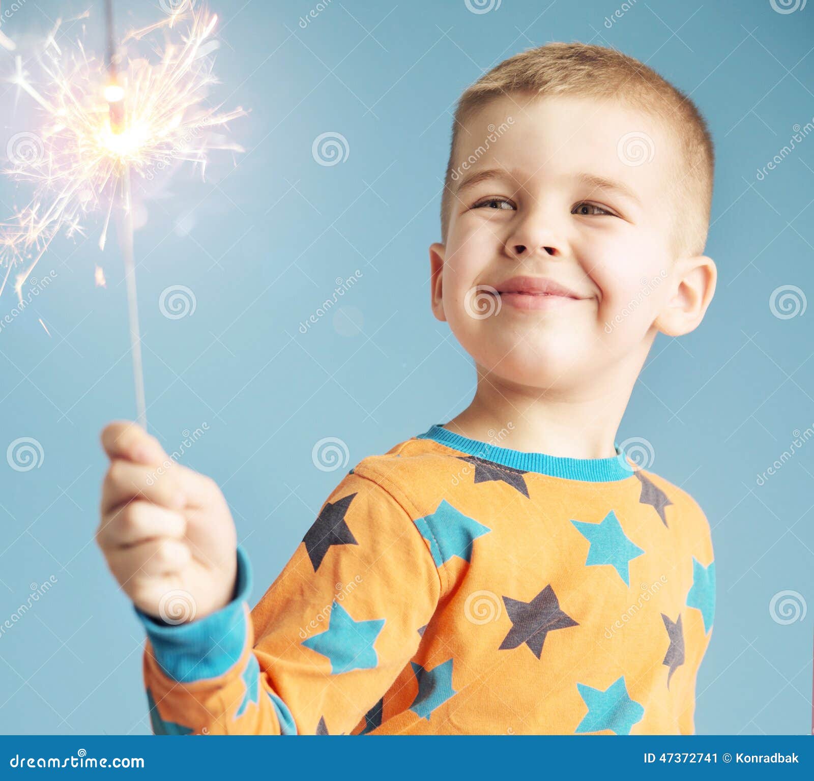 Delighted Boy Watching a Sparkler Stock Image - Image of shine, holiday ...
