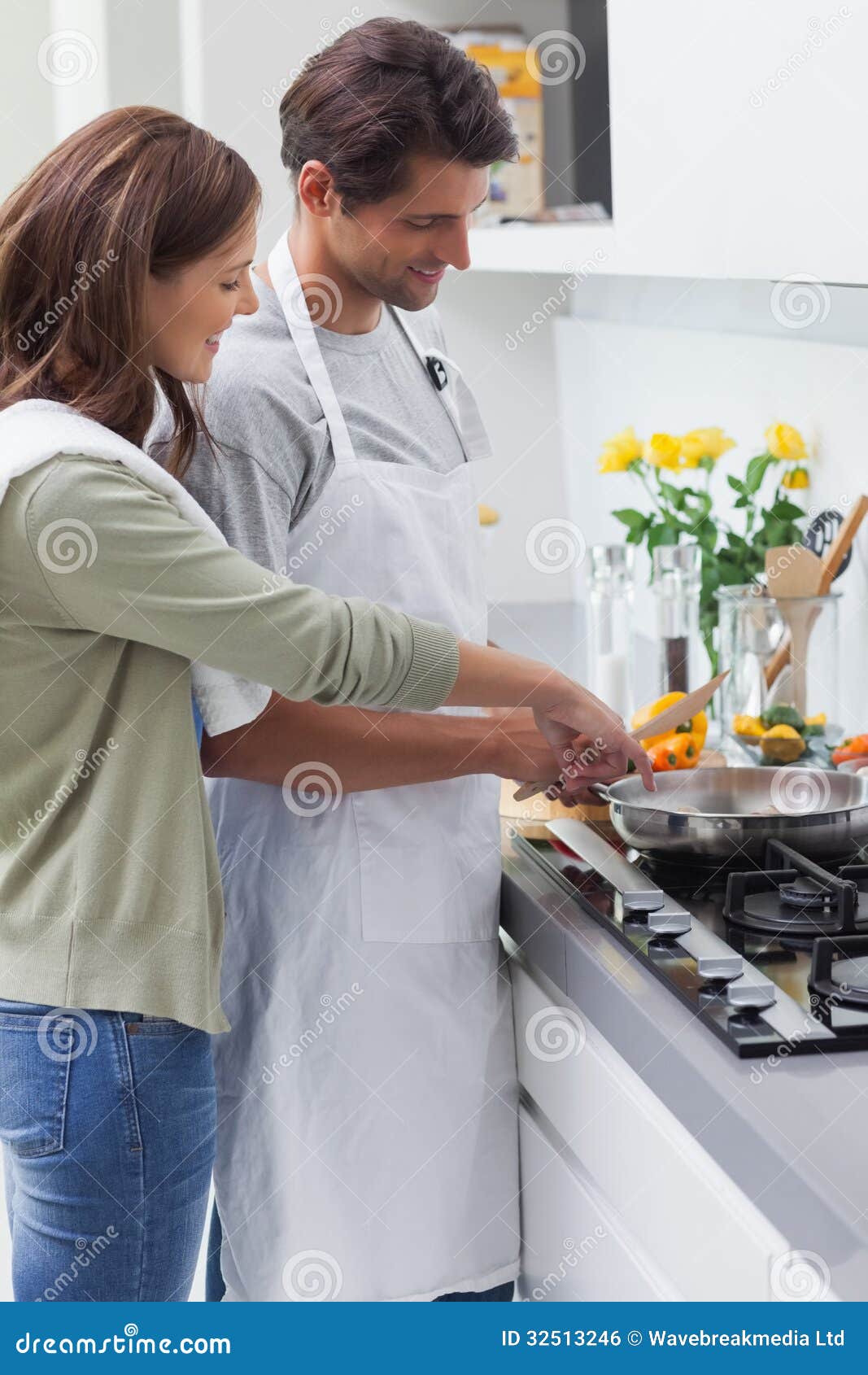 Delighted couple cooking stock photo. Image of kitchen - 32513246