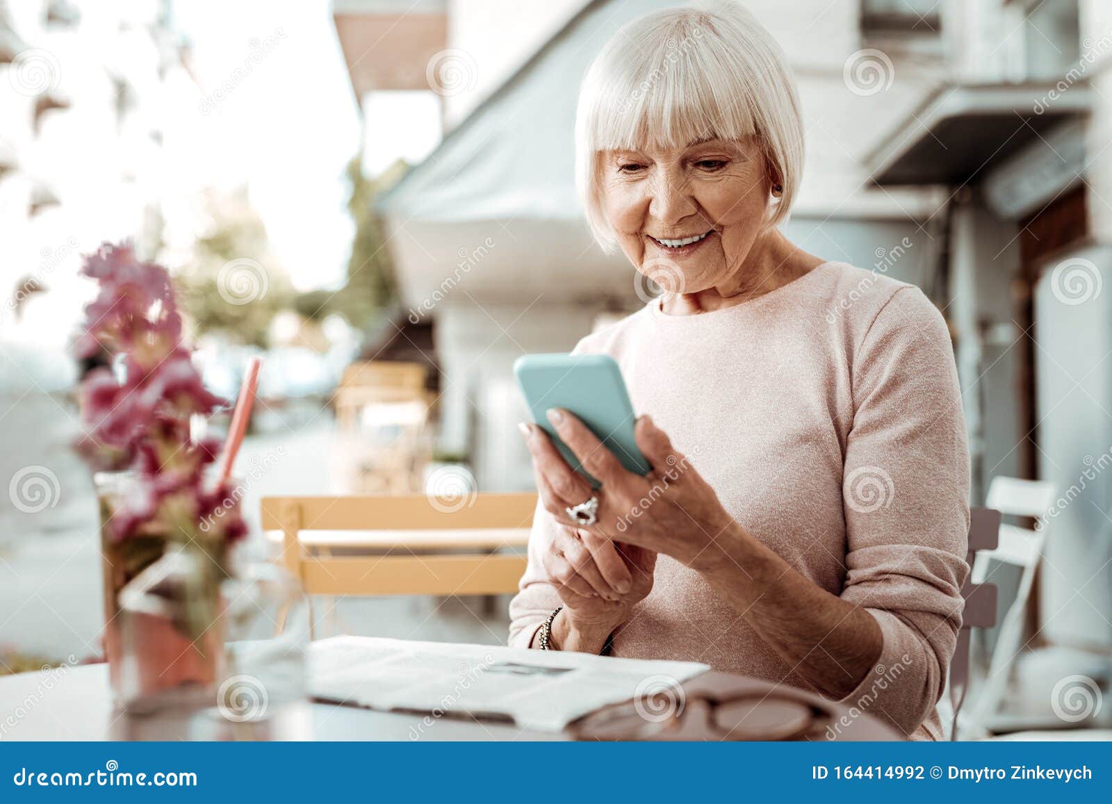 Delighted Elderly Woman Using Her New Smartphone Stock Photo - Image of ...