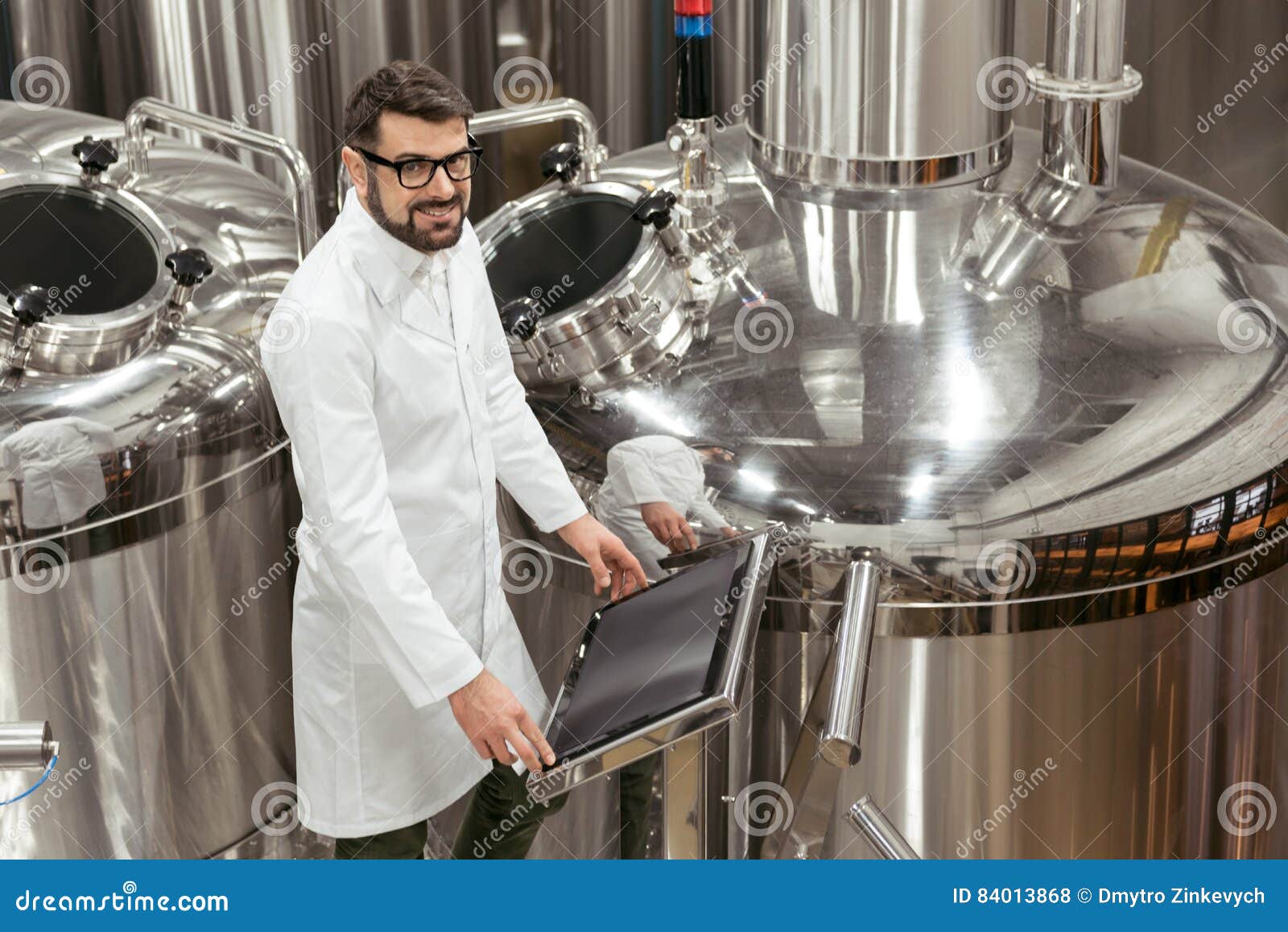 Delighted Man Using Computer at Beer Factory Stock Photo - Image of ...