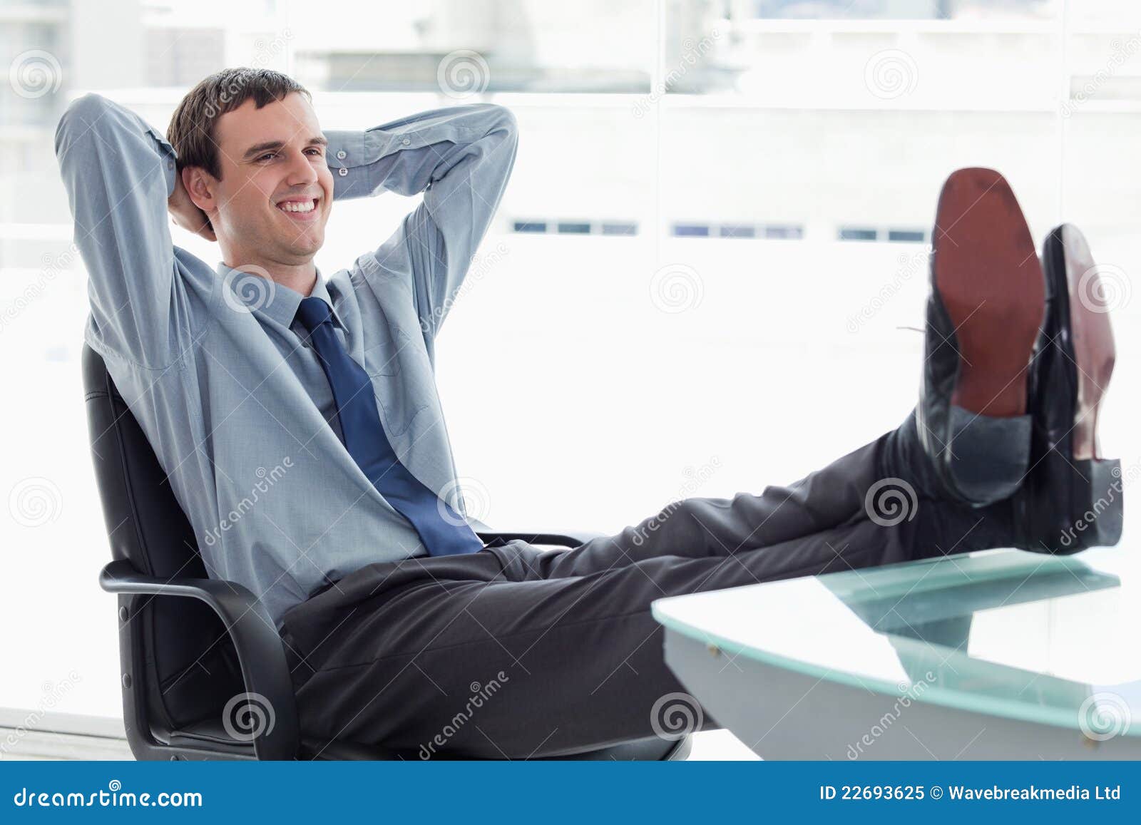 Delighted manager relaxing stock image. Image of attitude - 22693625