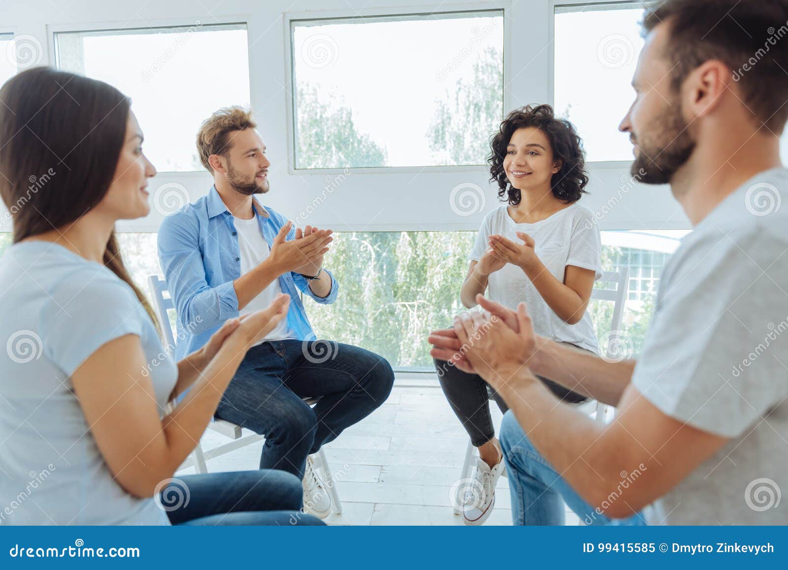 Delighted Positive Group Members Supporting Each Other Stock Image ...