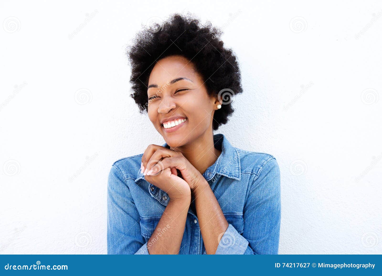 Delighted Woman Smiling by White Wall Stock Image - Image of blue, face ...