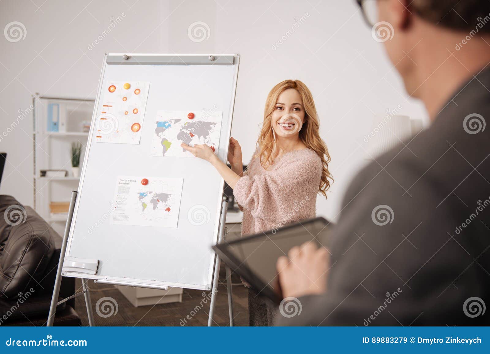 Delighted Young Office Manager Representing Strategy Project in the ...