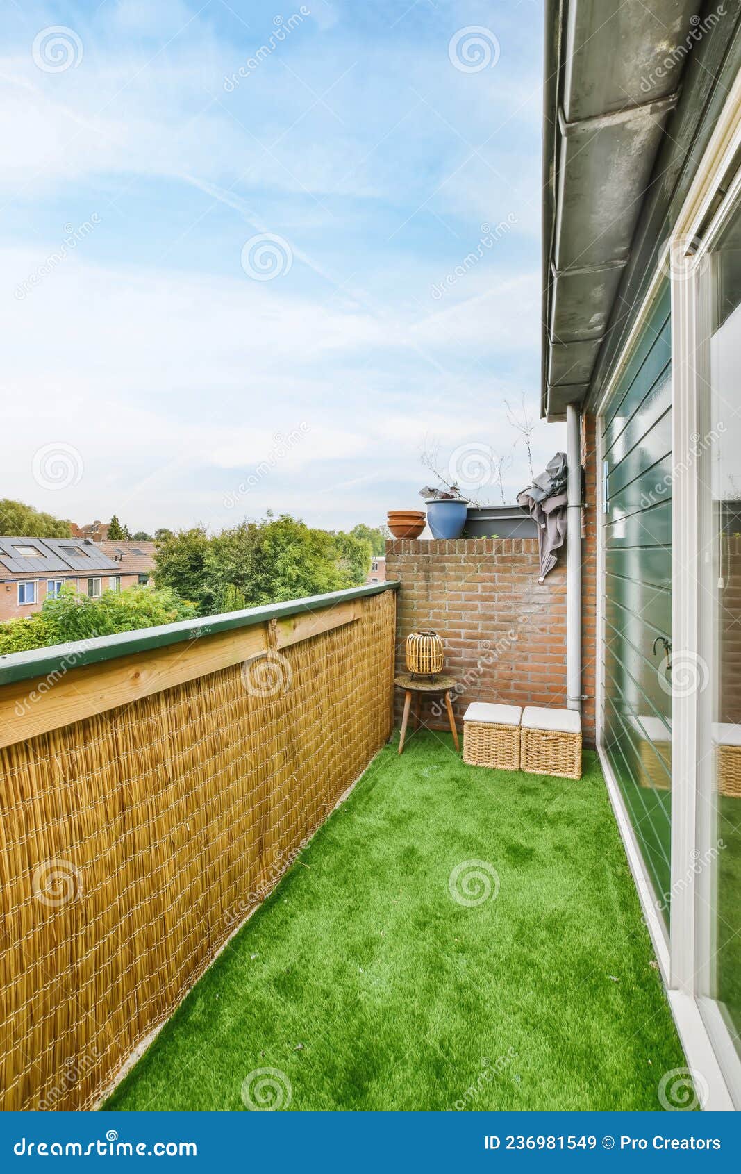 Delightful Balcony with Green Artificial Turf Stock Image - Image of ...