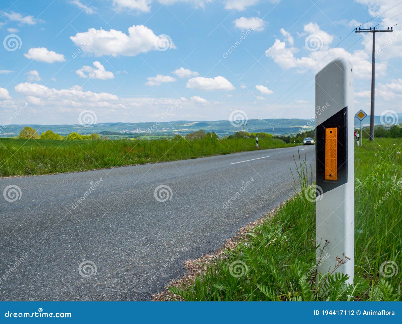 Safety Delineator With White Stripe On Plastic Pole. Traffic Safety ...