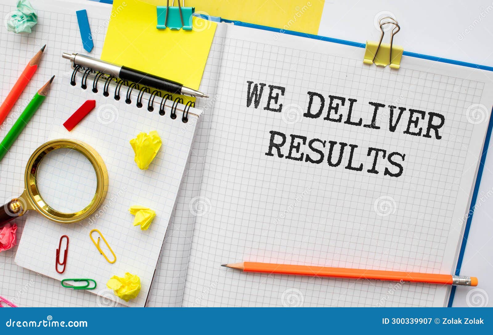 We DELIVER RESULTS Text on Notebook with Pen on a Chart Background ...