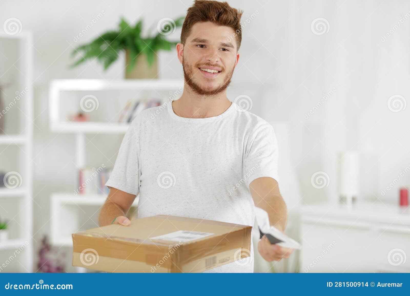 Deliverer Giving Package Box To Young Man Stock Photo - Image of ...