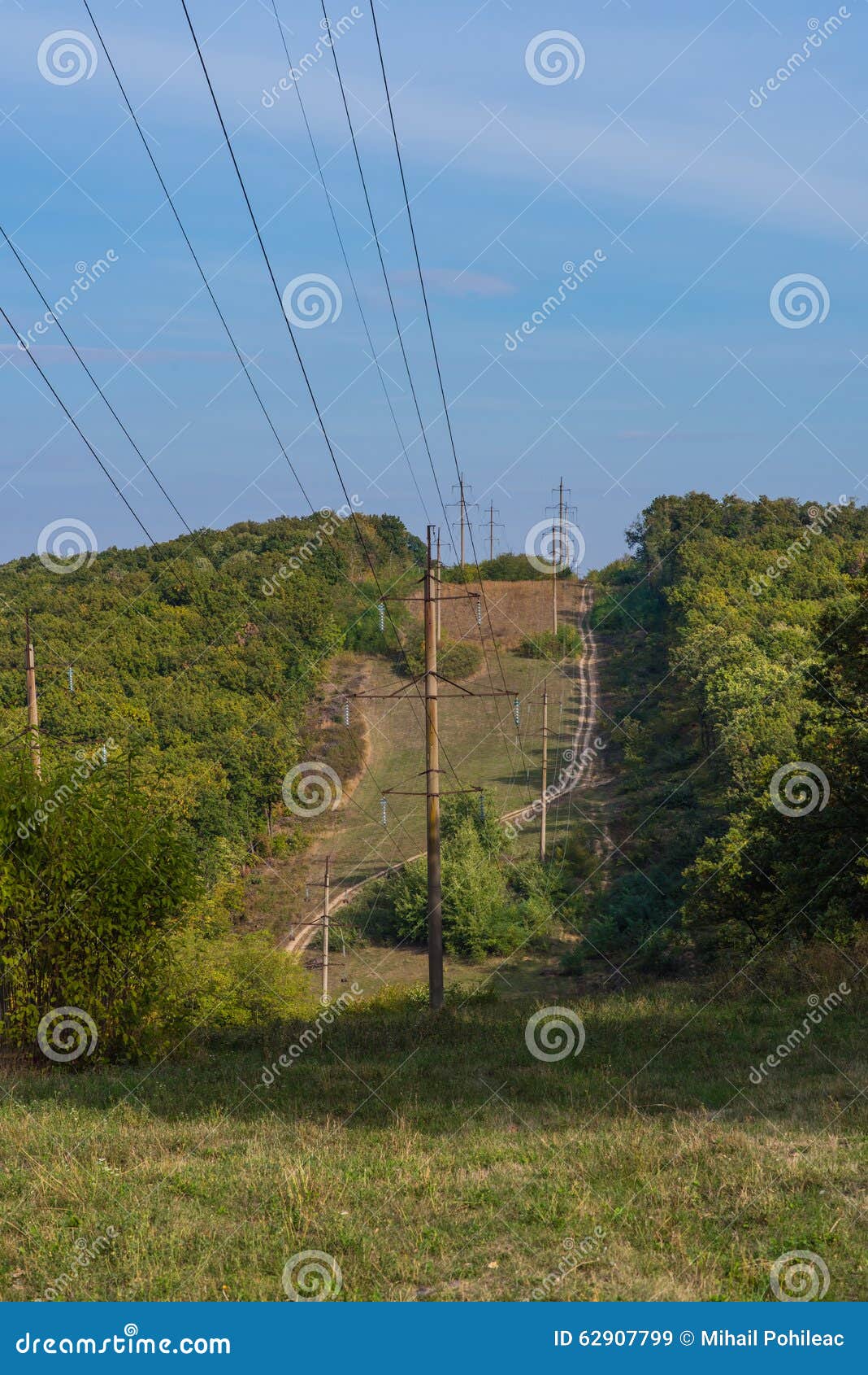 Delivering electricity. stock image. Image of grass, green - 62907799