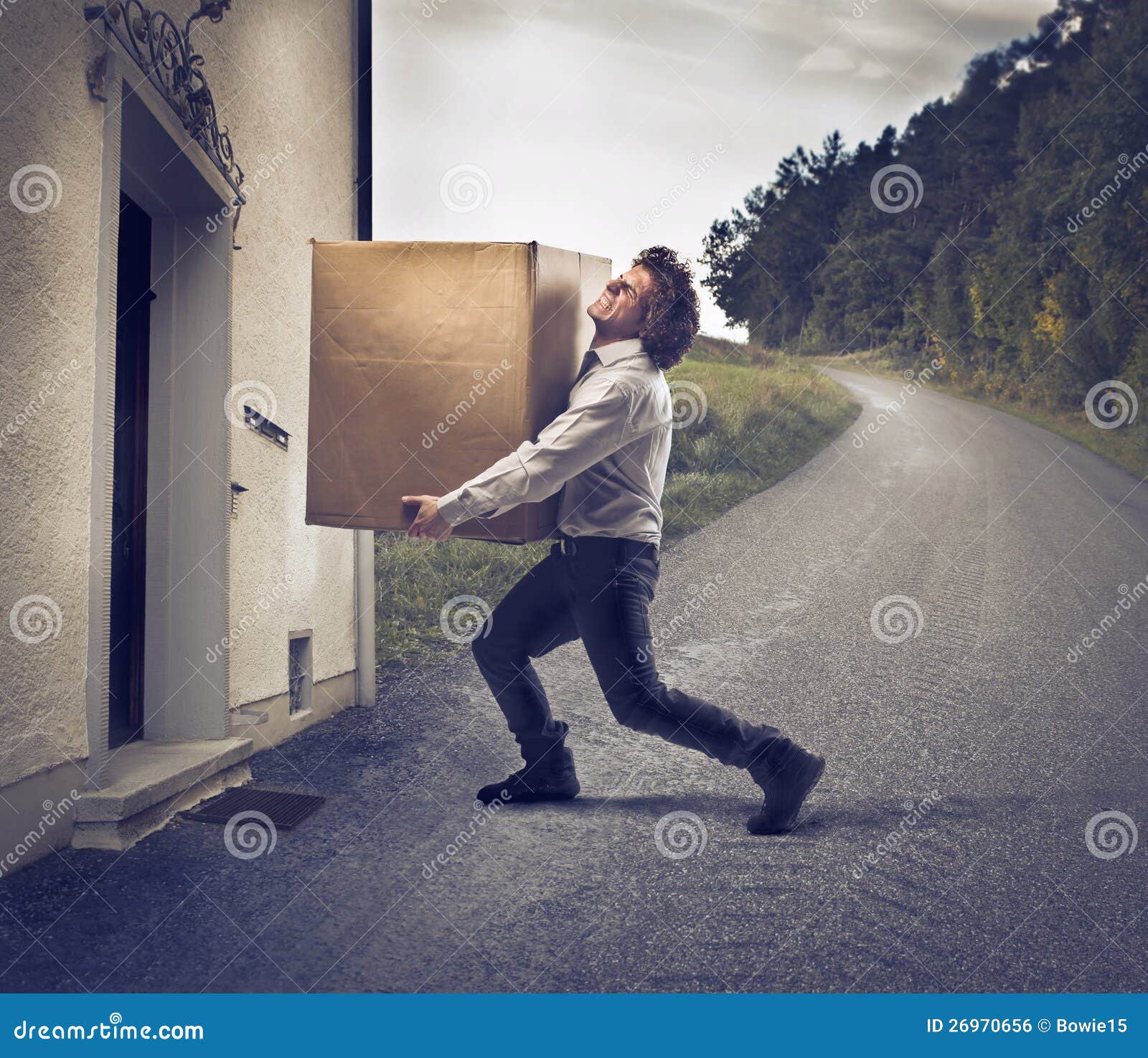 Delivering a Heavy Box stock photo. Image of stress, weight - 26970656