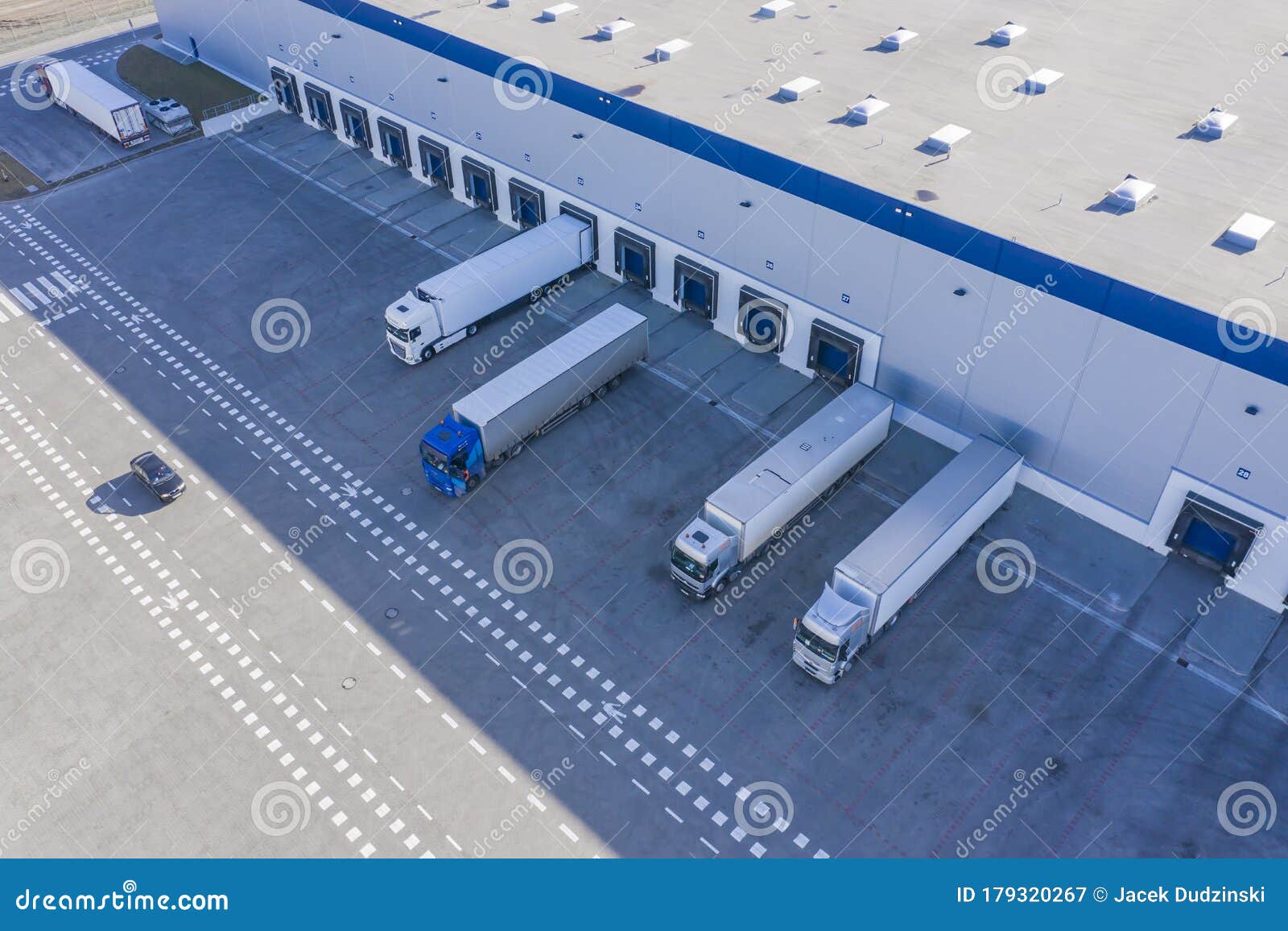 Delivering Or Supply Concept Image. Trucks Loading At Facility ...