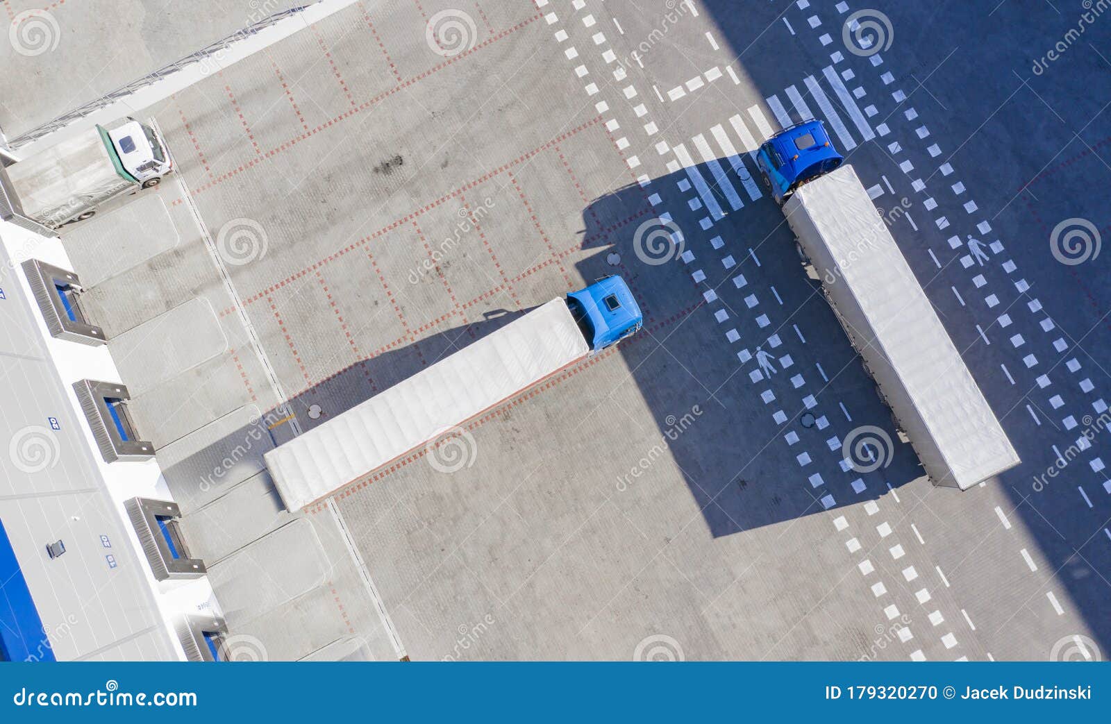 Delivering or Supply Concept Image. Trucks Loading at Facility ...