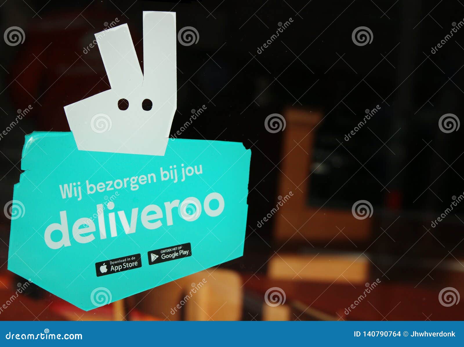 Deliveroo Logo at a Window of a Restaurant with Space for Text at One ...