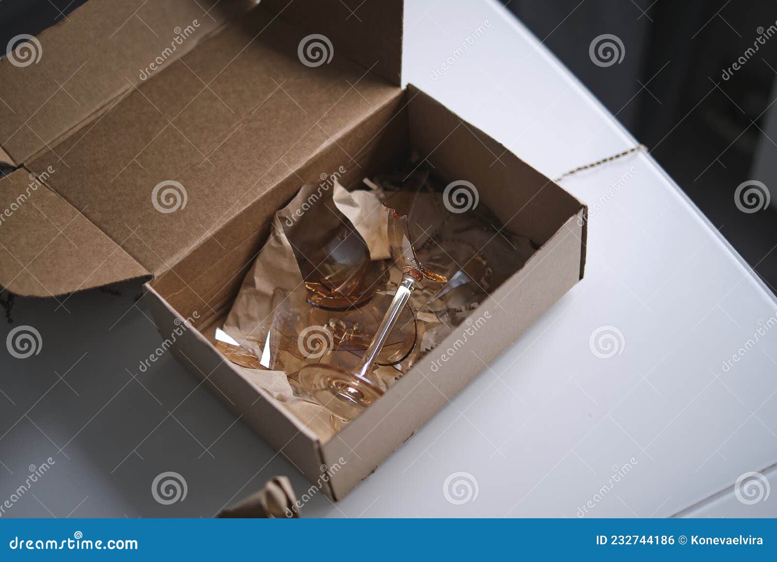 Delivery Box from a Store and Discovers a Broken Glass. an Improperly ...