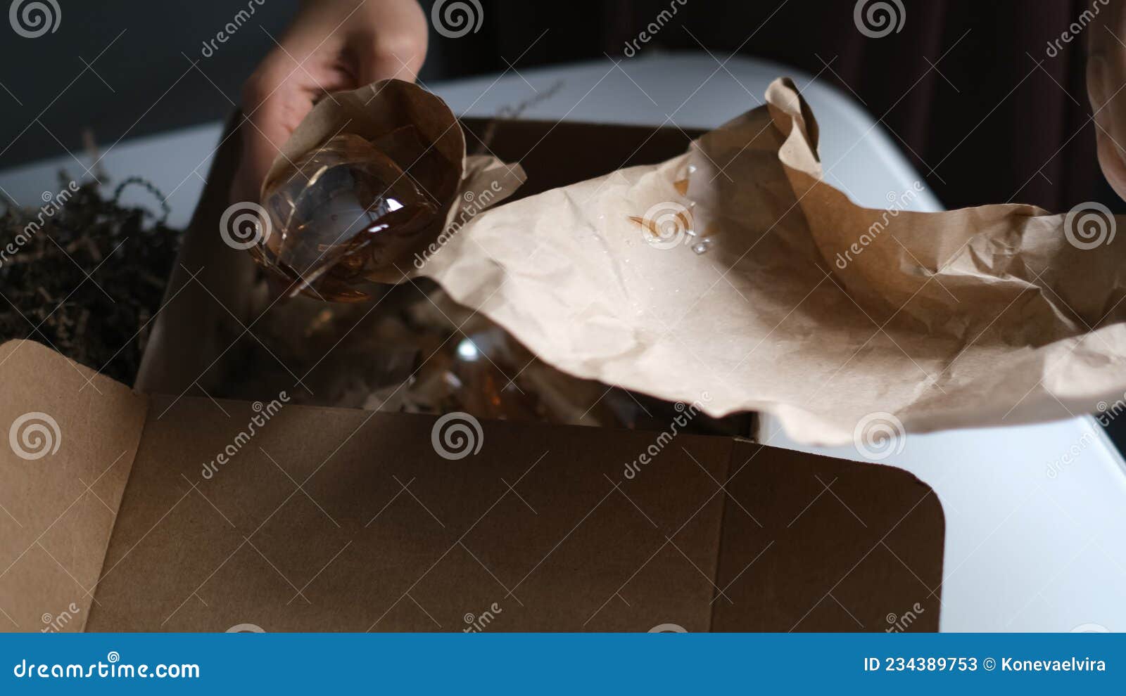 Delivery Box from a Store and Discovers a Broken Glass. an Improperly ...