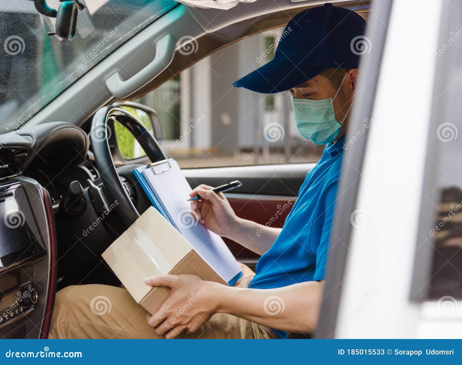Delivery Courier Young Man Driver Inside the Van Car with Parcel Post ...