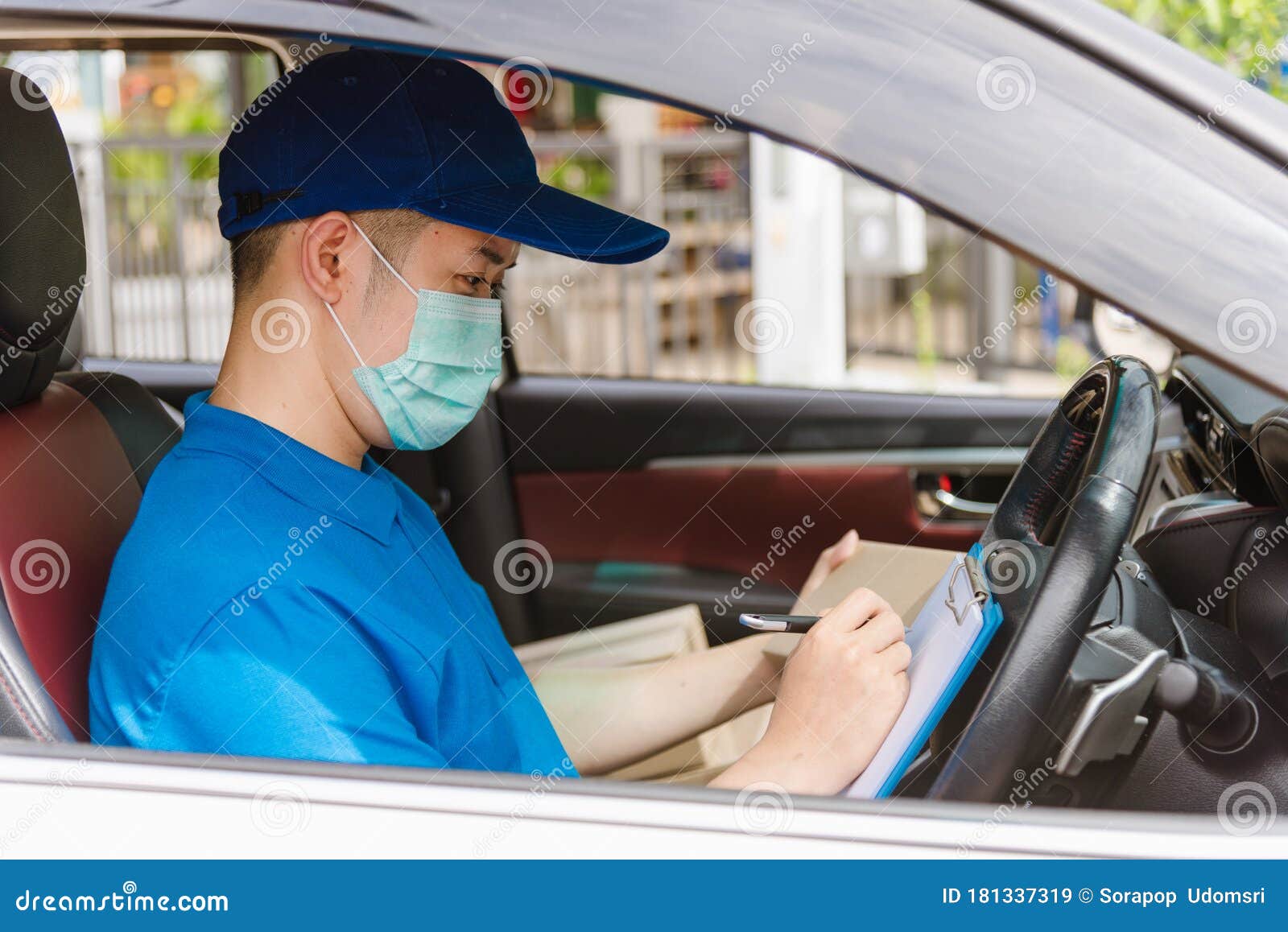 Delivery Courier Young Man Driver Inside the Van Car with Parcel Post ...