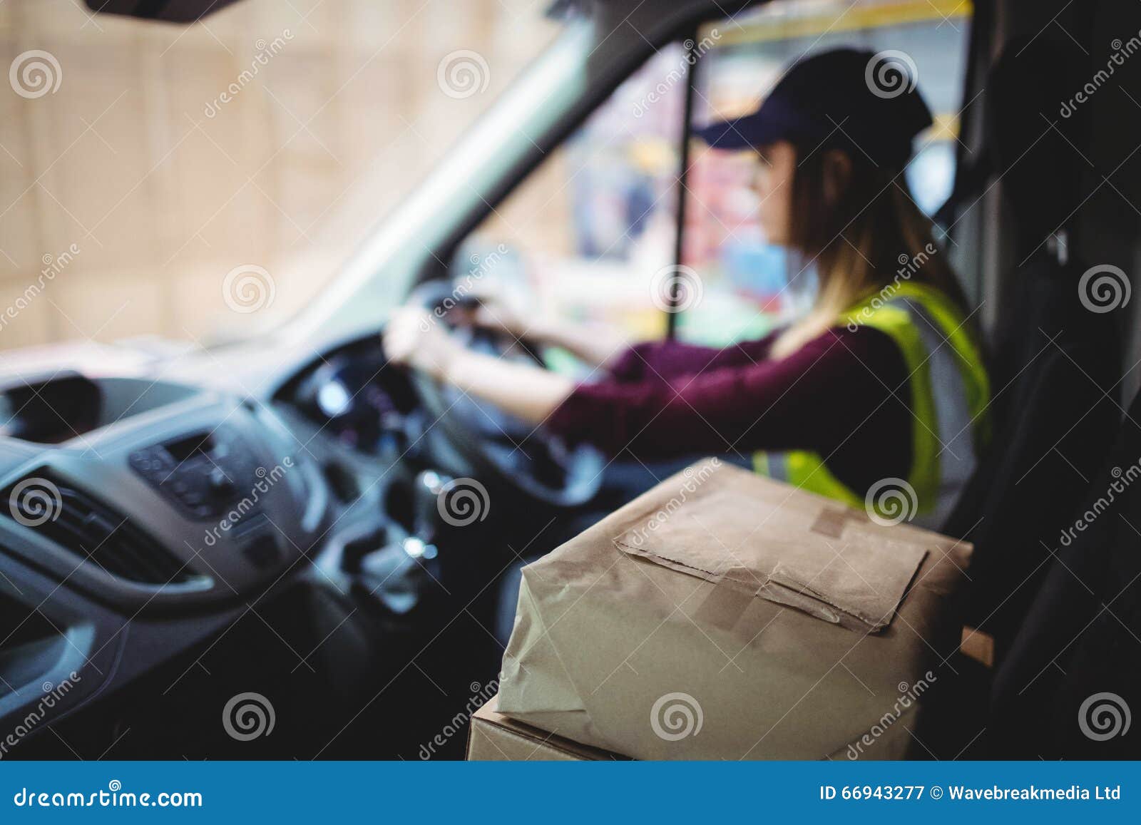Delivery Driver Driving Van with Parcels on Seat Stock Image - Image of ...