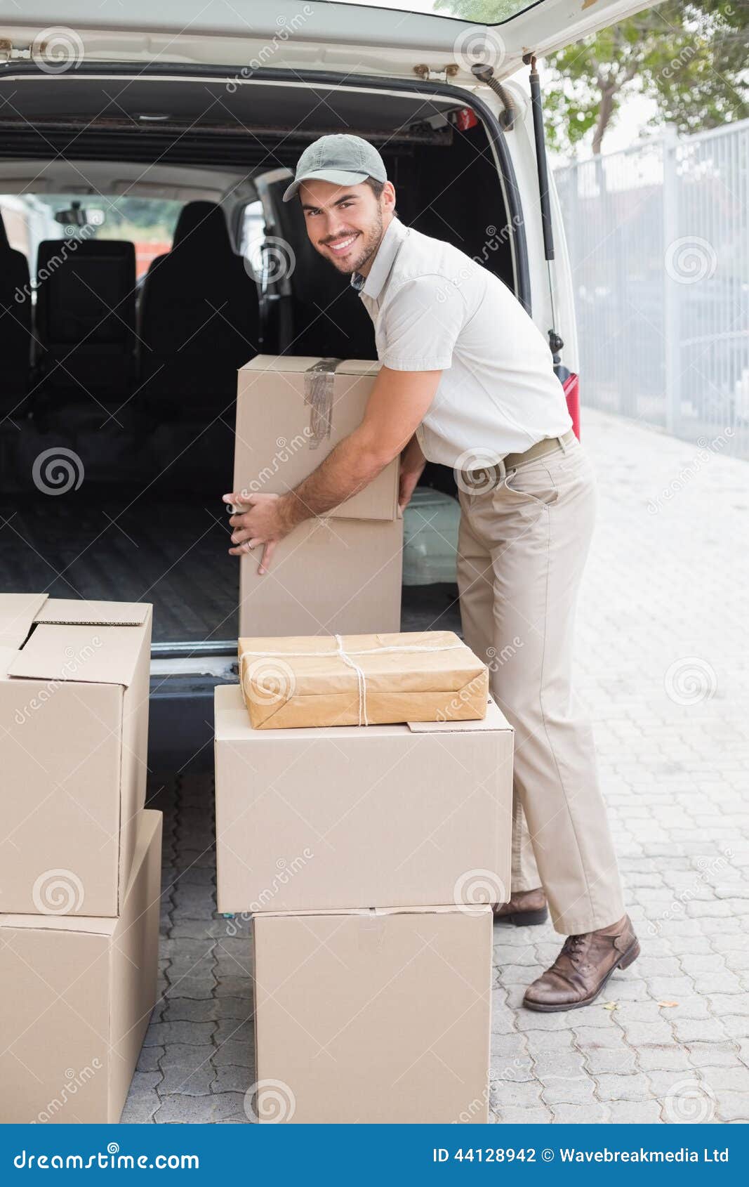 Delivery Driver Loading His Van with Boxes Stock Photo - Image of ...