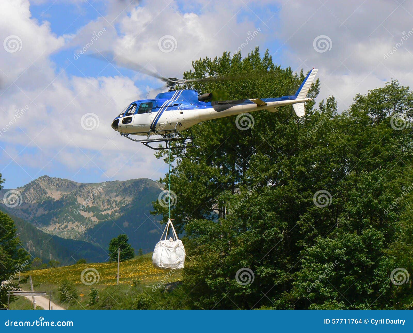 Delivery by helicopter stock photo. Image of mountains - 57711764
