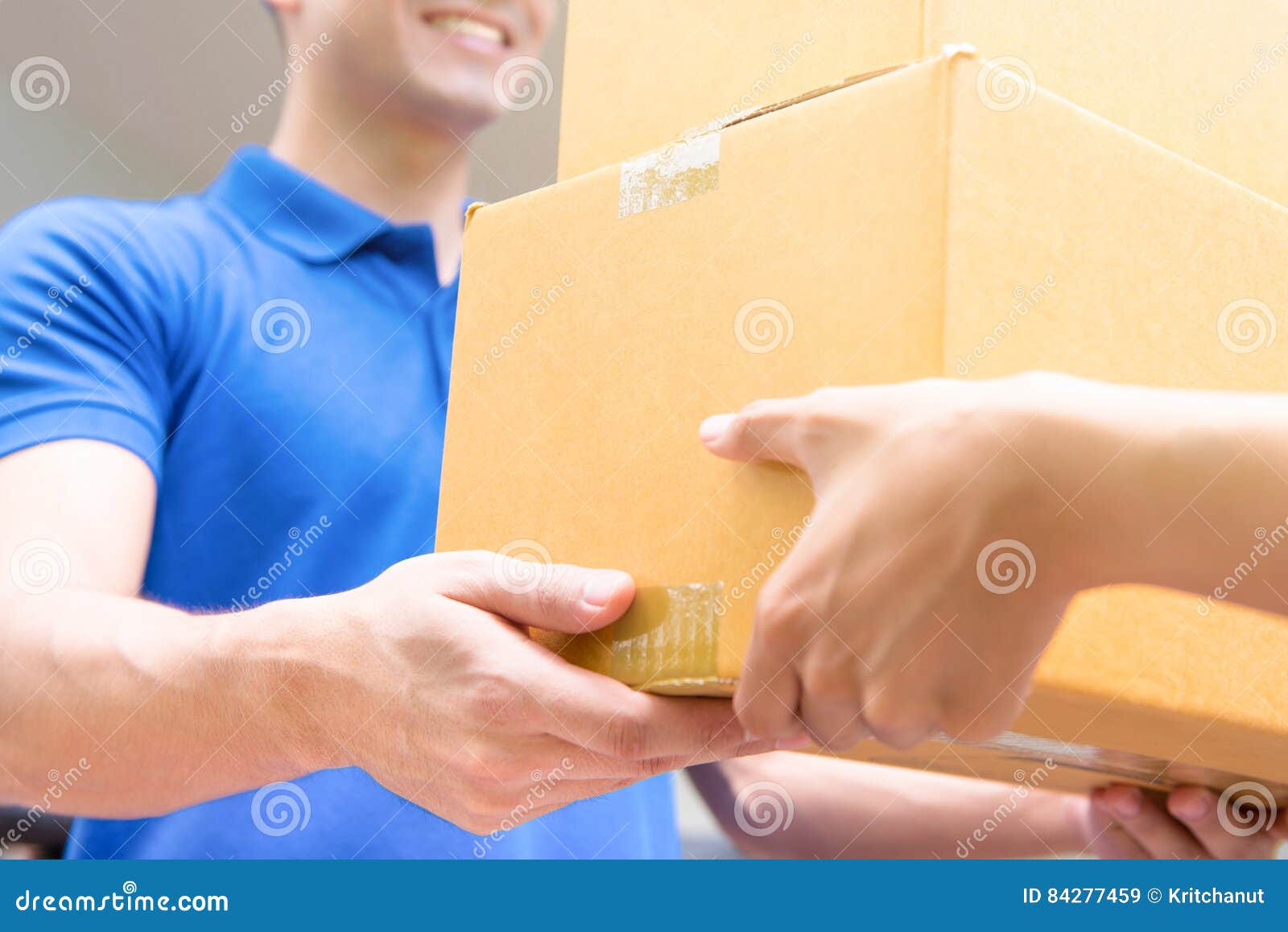 Delivery Man Handing Over A Registered Letter Royalty-Free Stock Photo ...